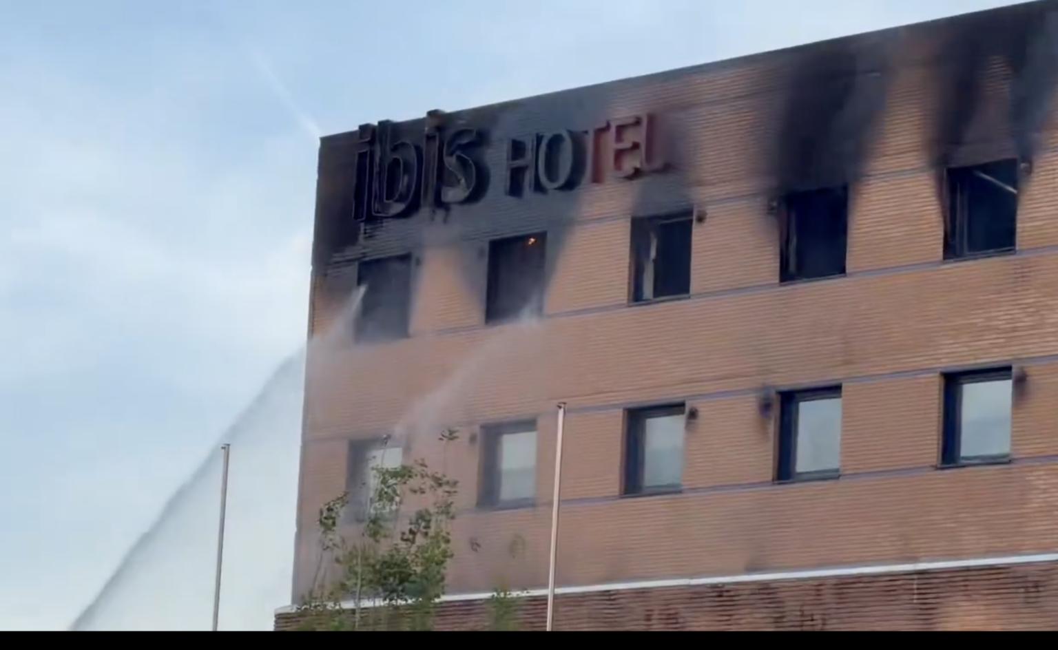 WATCH: Huge inferno at Malaga Ibis reignites as firefighters warn hotel ...